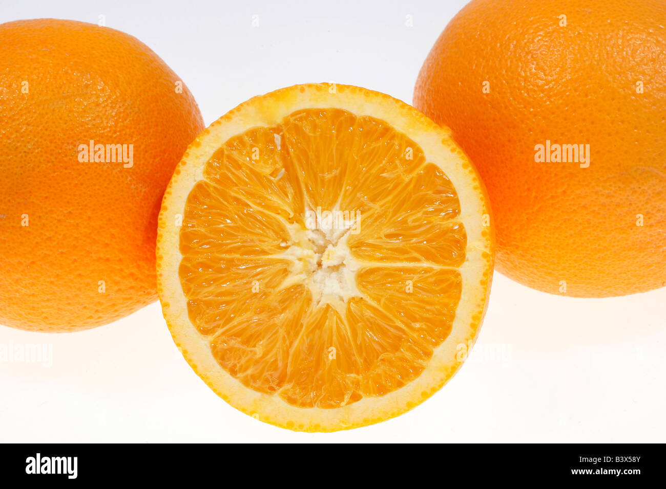 Four fresh delicious orange hi-res stock photography and images - Alamy