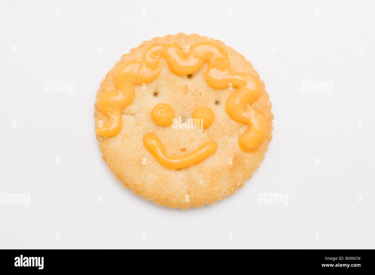 Happy face cracker Stock Photo - Alamy