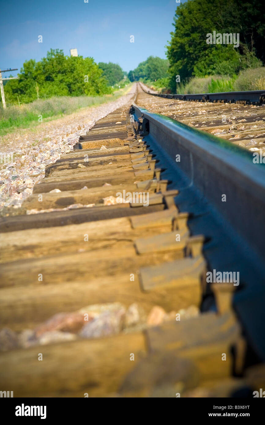 Train tracks running away into the distance Stock Photo - Alamy