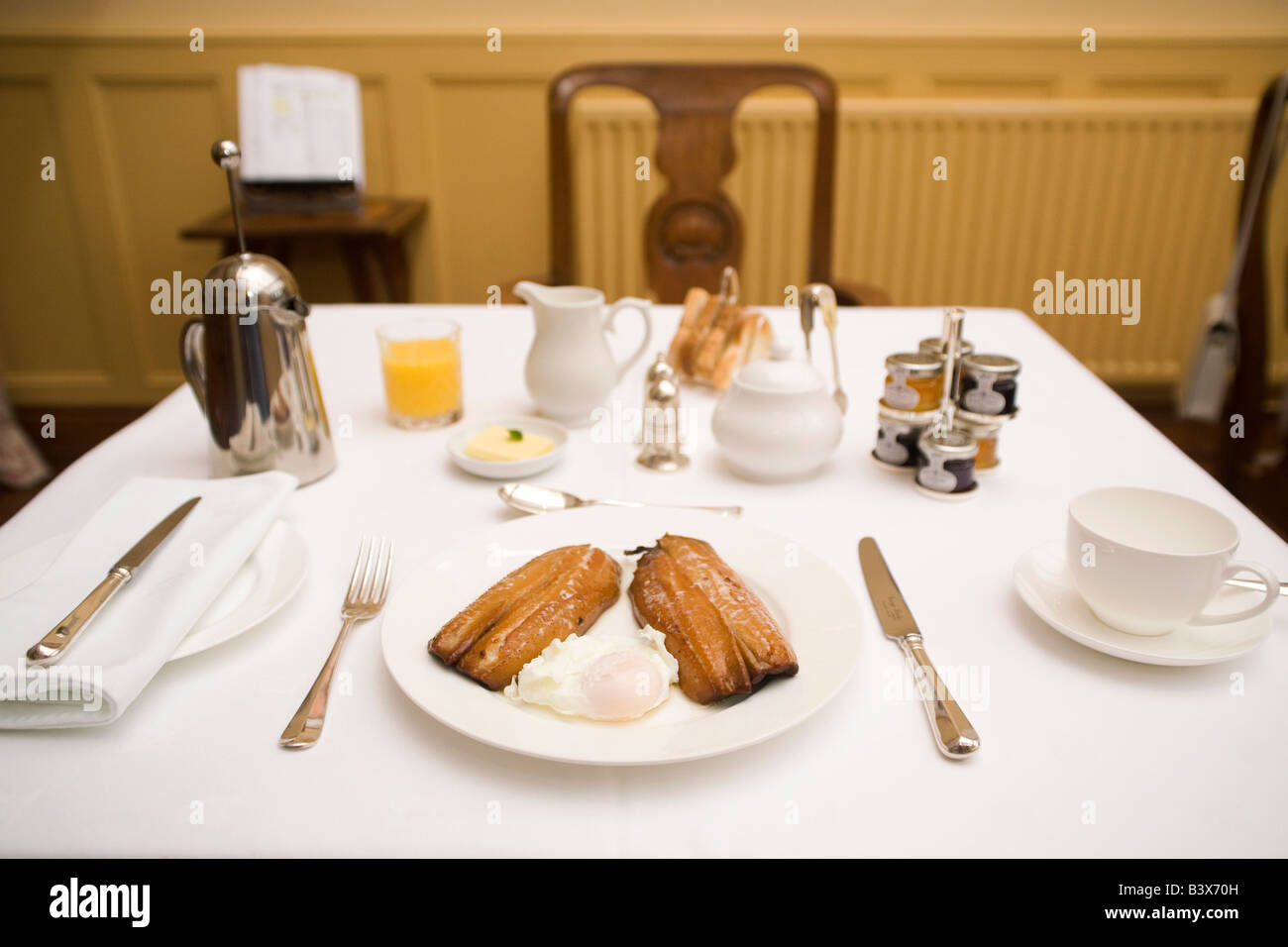 A breakfast of Craster kippers, coffee orange, juice and toast. This is ...
