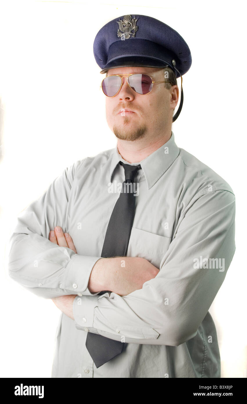 A uniformed police officer isolated on white Stock Photo - Alamy