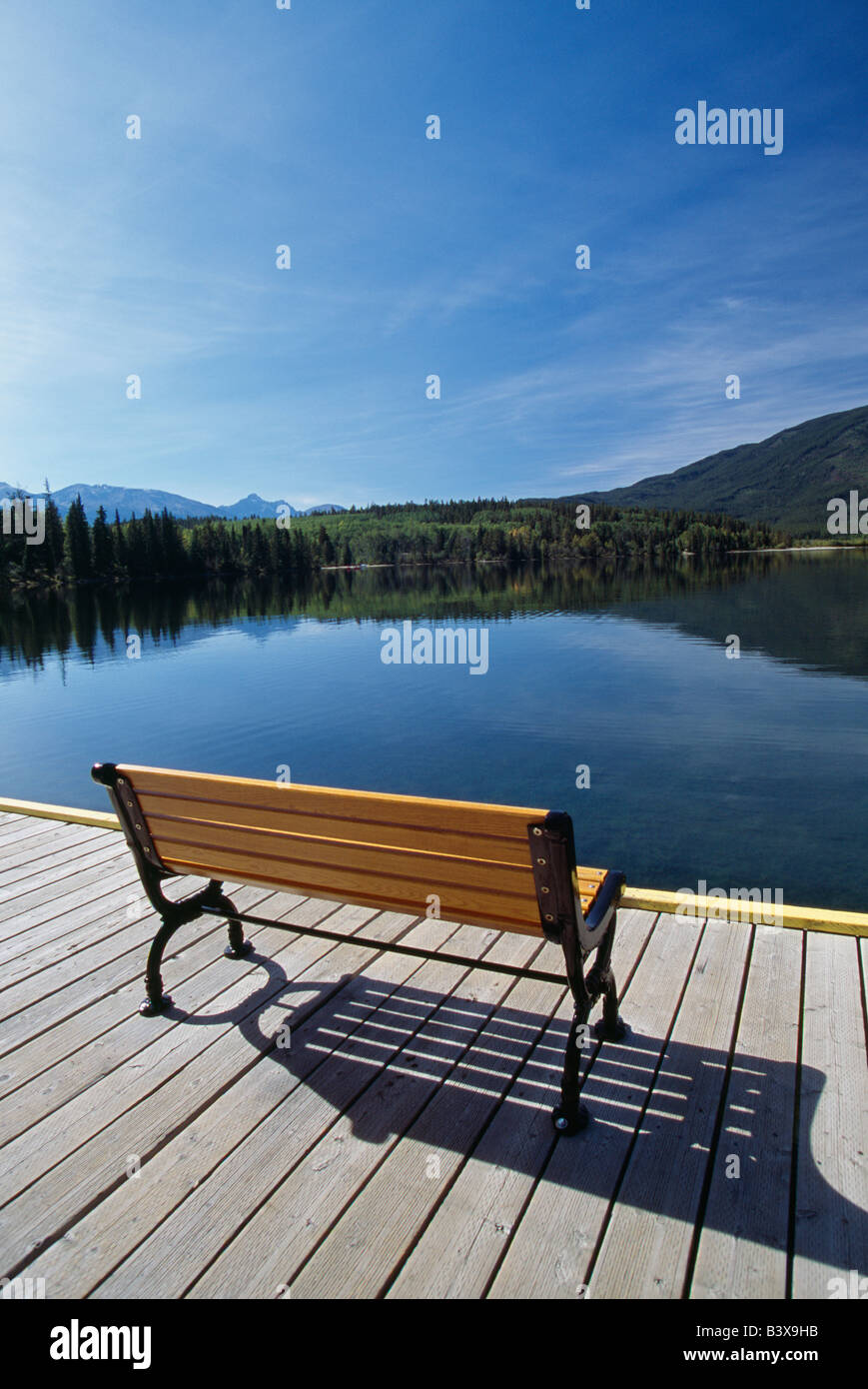 Bench on a dock at Pyramid Lake, Jasper National Park, Alberta, Canada ...