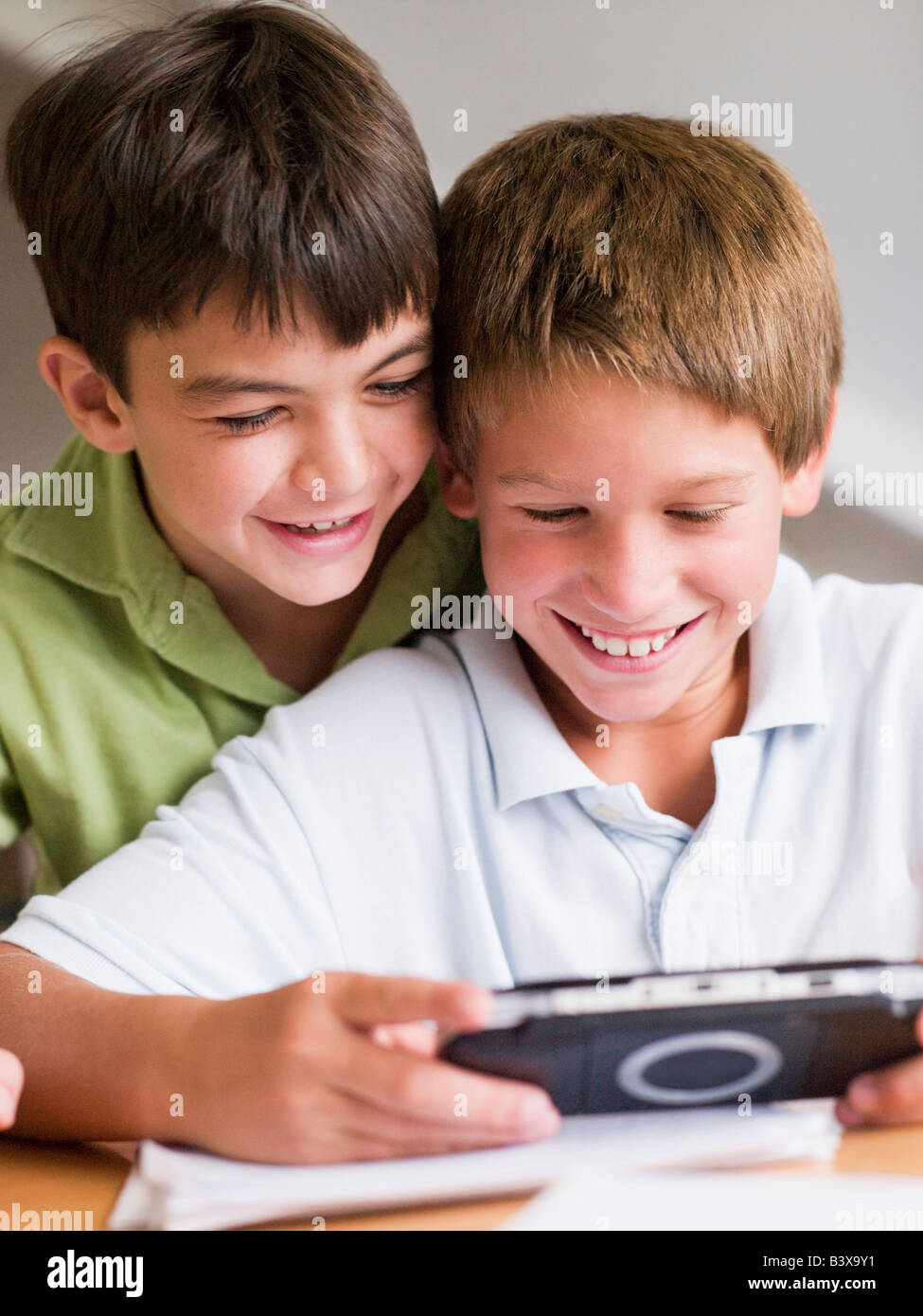 Two Children Playing A Video Game High Resolution Stock Photography and ...
