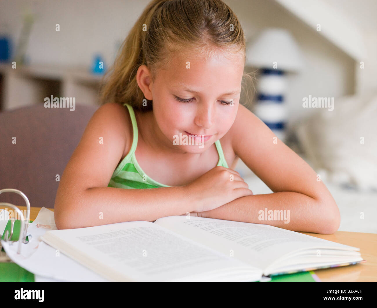 Young Girl Doing Her Homework Stock Photo - Alamy