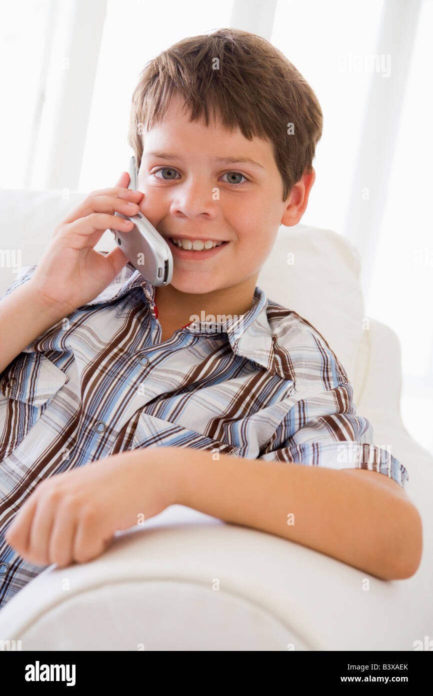 Boy talking on mobile hi-res stock photography and images - Alamy