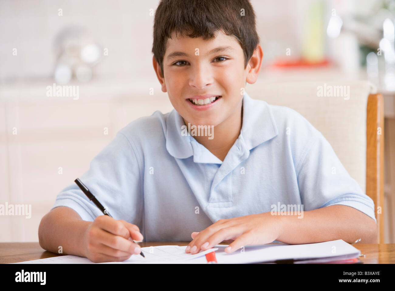 Boy Doing His Homework Stock Photo - Alamy