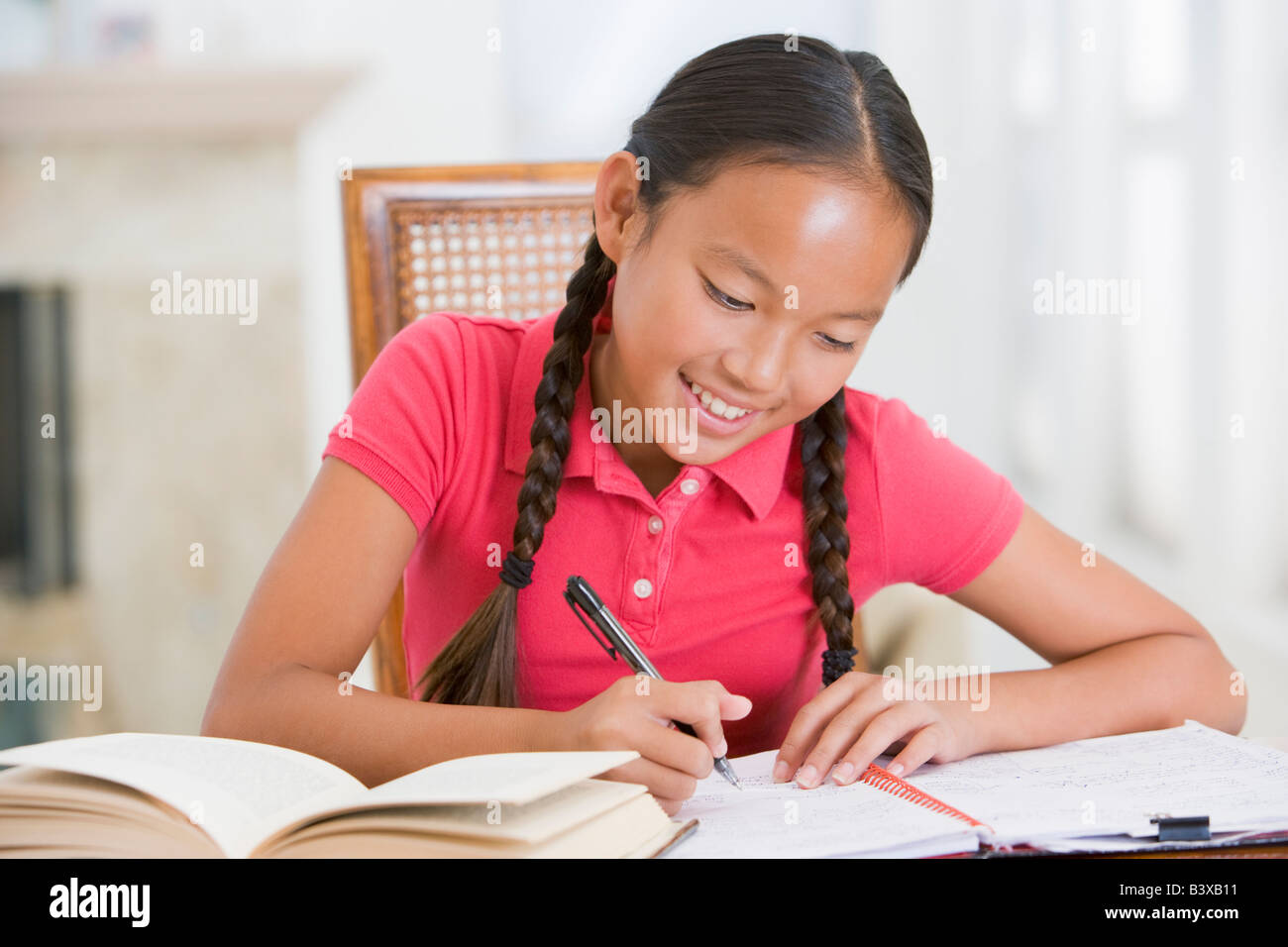 Girl Doing Her Homework Stock Photo - Alamy