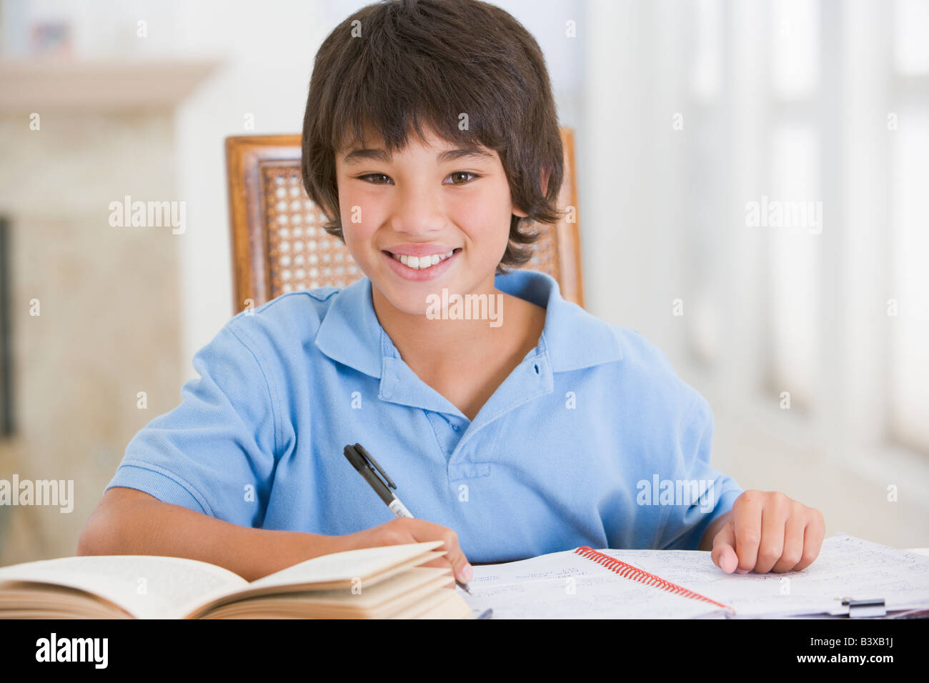 Boy Doing His Homework Stock Photo - Alamy