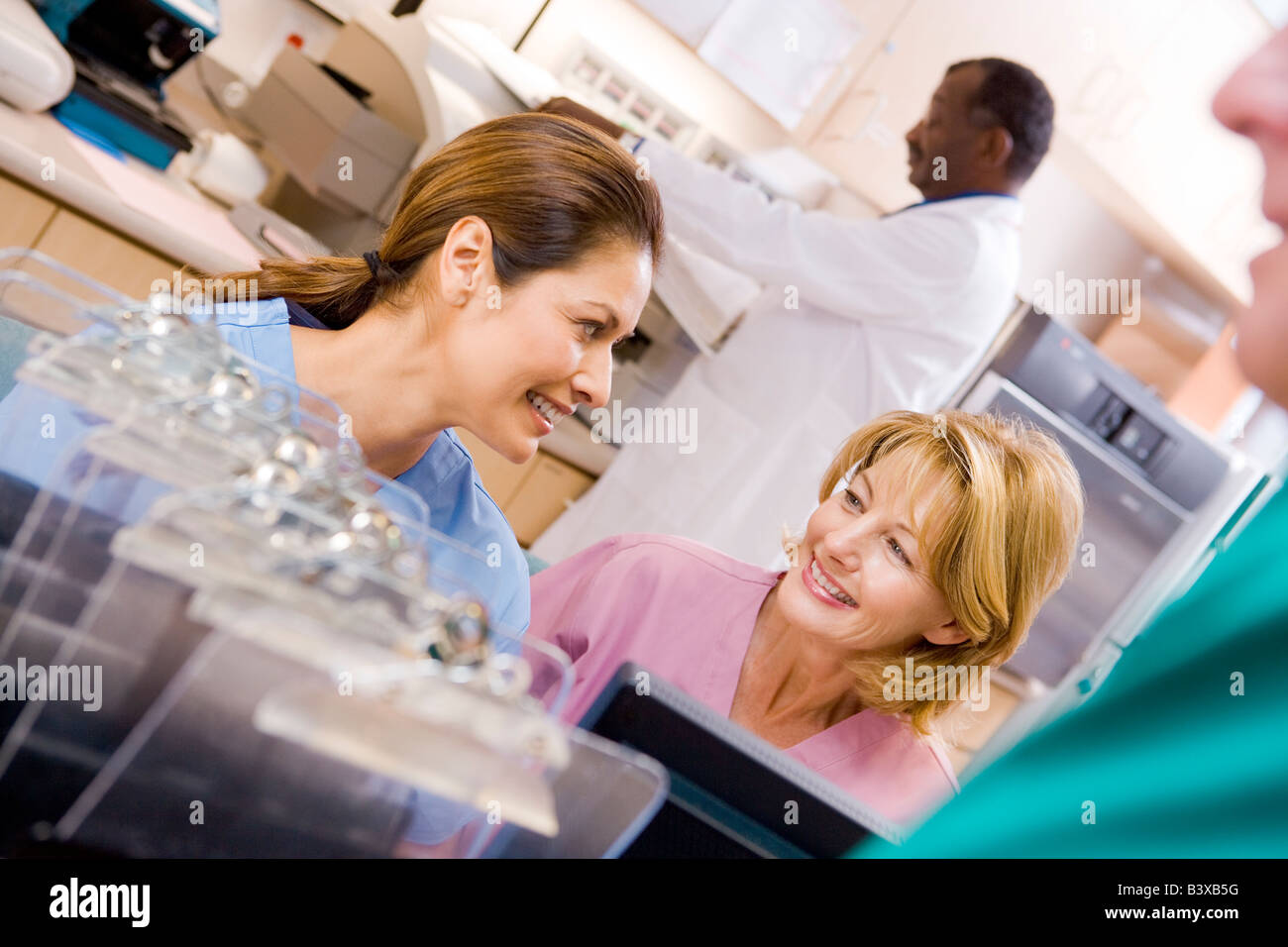 Nurses Talking To Each Other High Resolution Stock Photography and ...