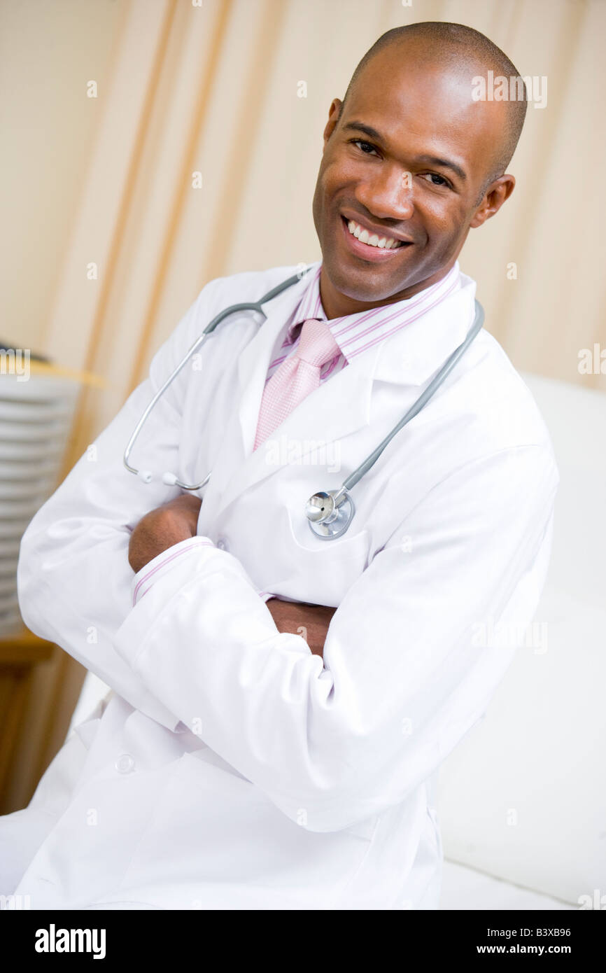 A Doctor Sitting On A Hospital Bed Stock Photo - Alamy