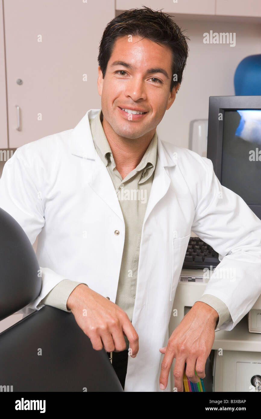 A Doctor Standing By A Computer Monitor Stock Photo - Alamy