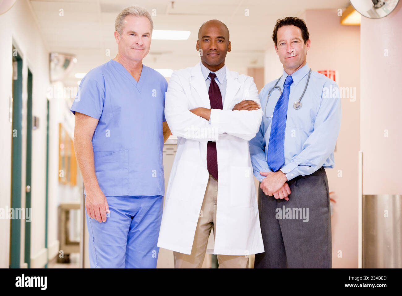 Doctors Standing In A Hospital Corridor Stock Photo - Alamy
