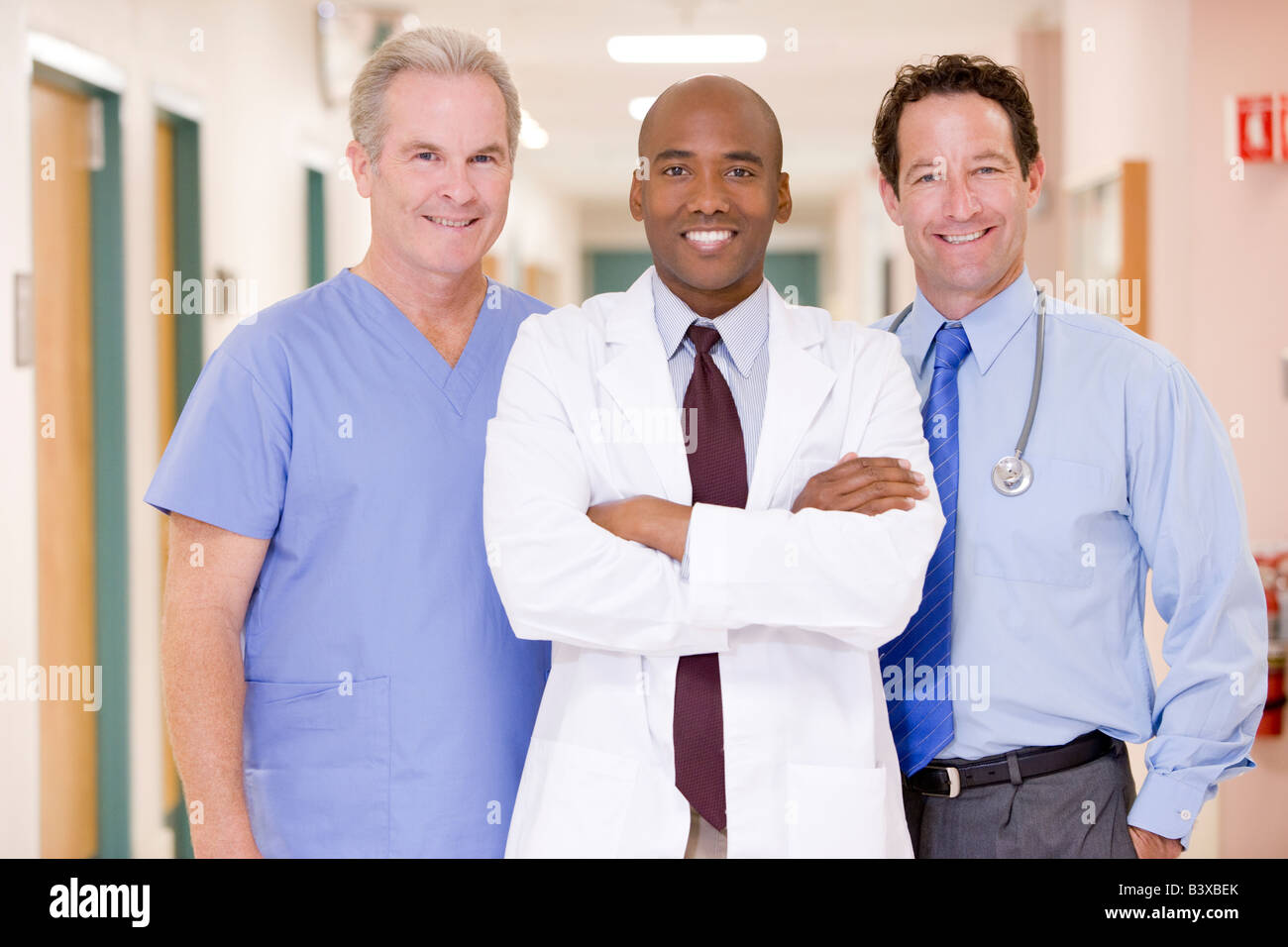 Doctors Standing In A Hospital Corridor Stock Photo - Alamy