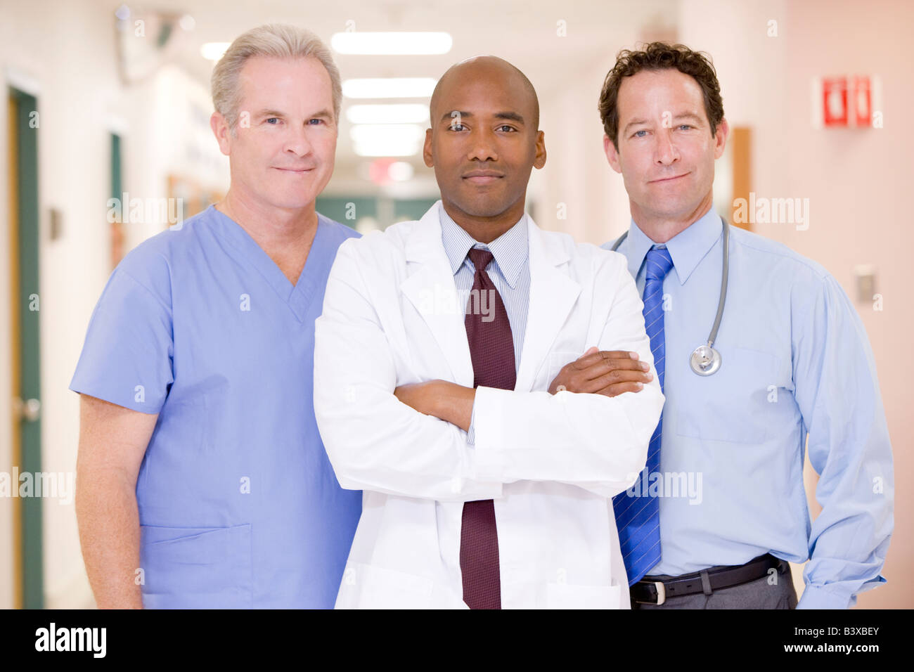 Doctors Standing In A Hospital Corridor Stock Photo - Alamy