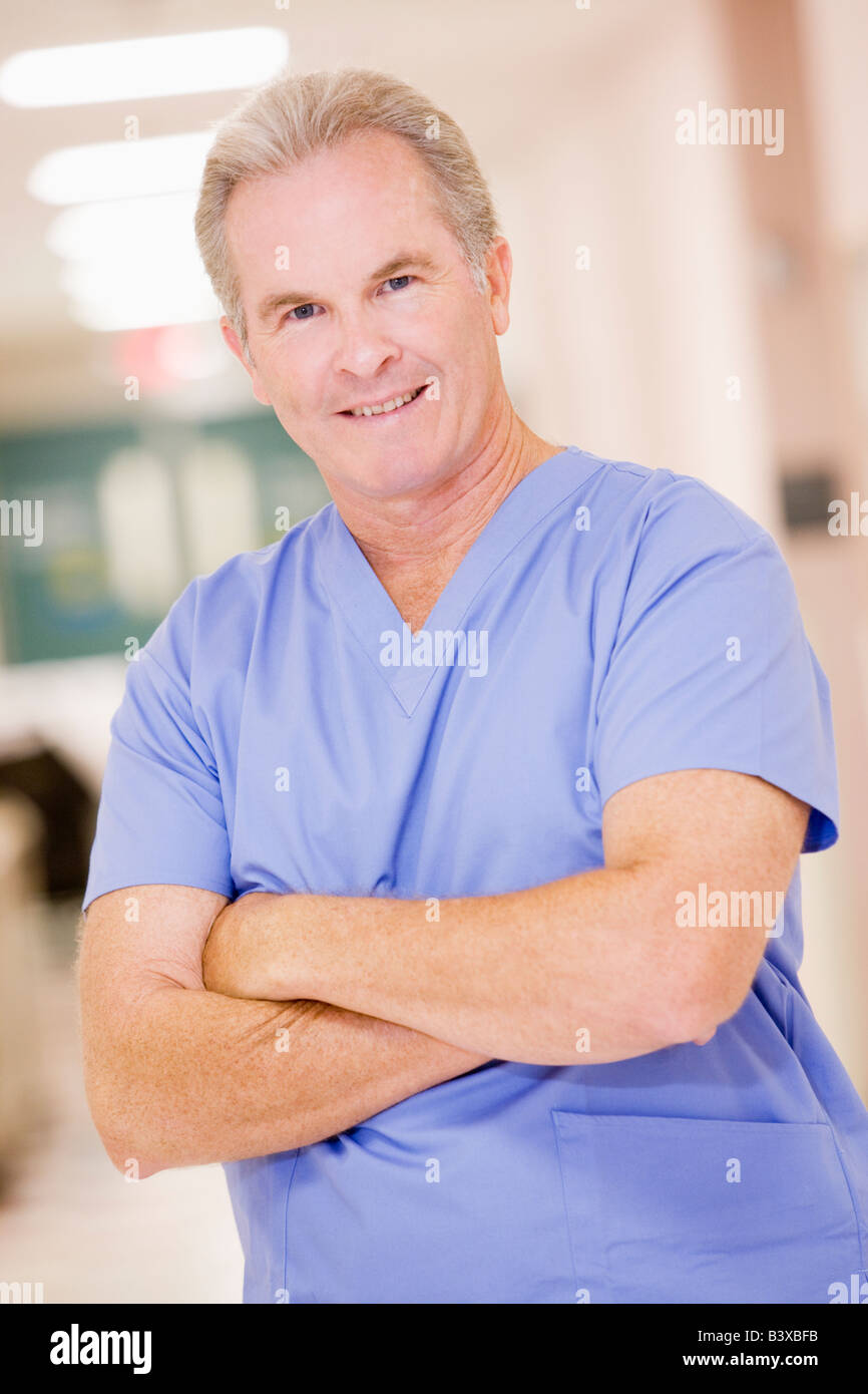 Doctor Standing In A Hospital Corridor Stock Photo - Alamy
