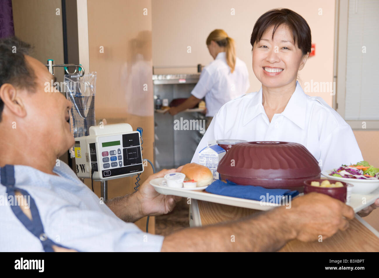 Nurse Serving Patient Meal In High Resolution Stock Photography and ...