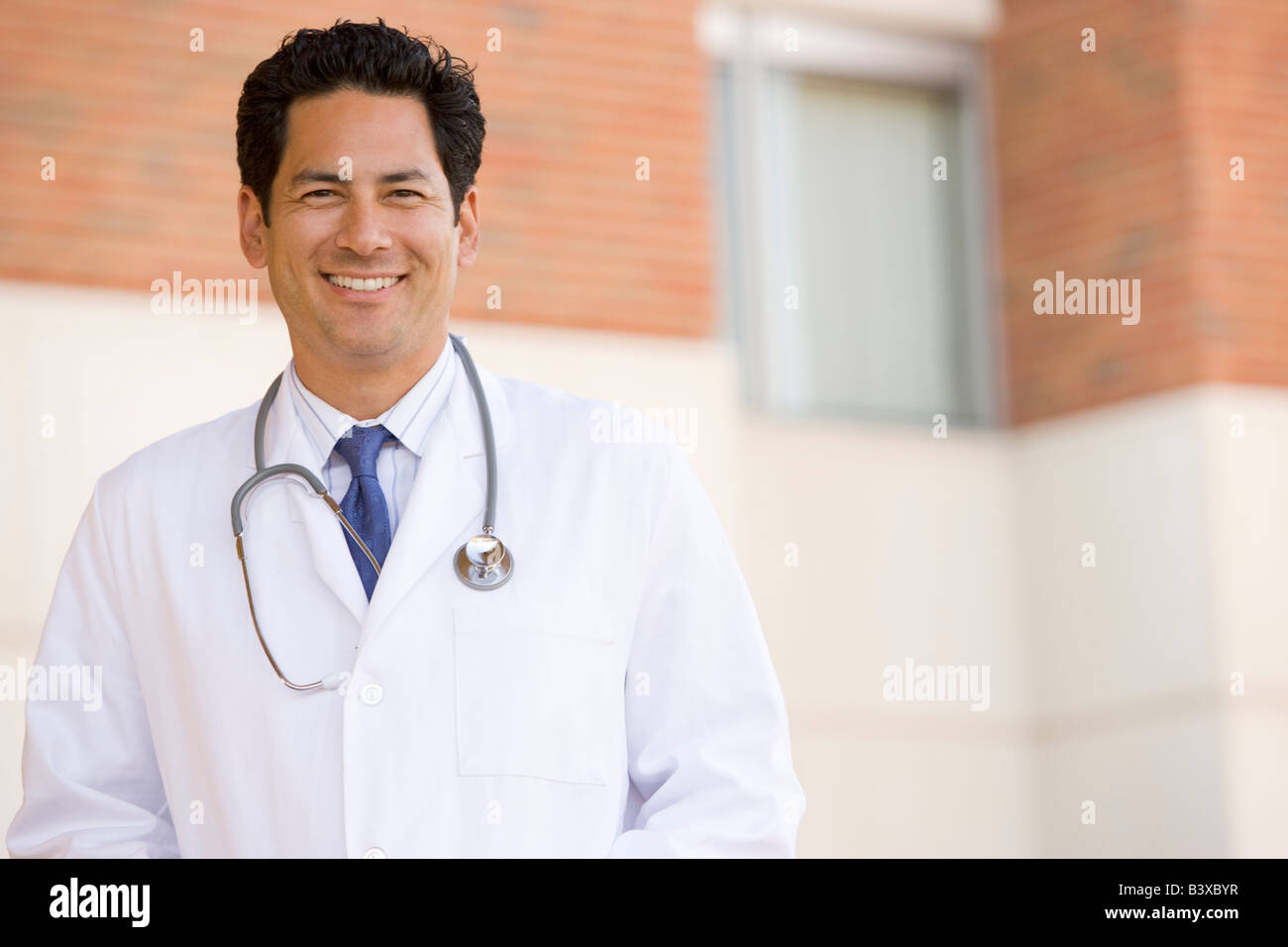 Doctor standing outside a hospital hi-res stock photography and images ...