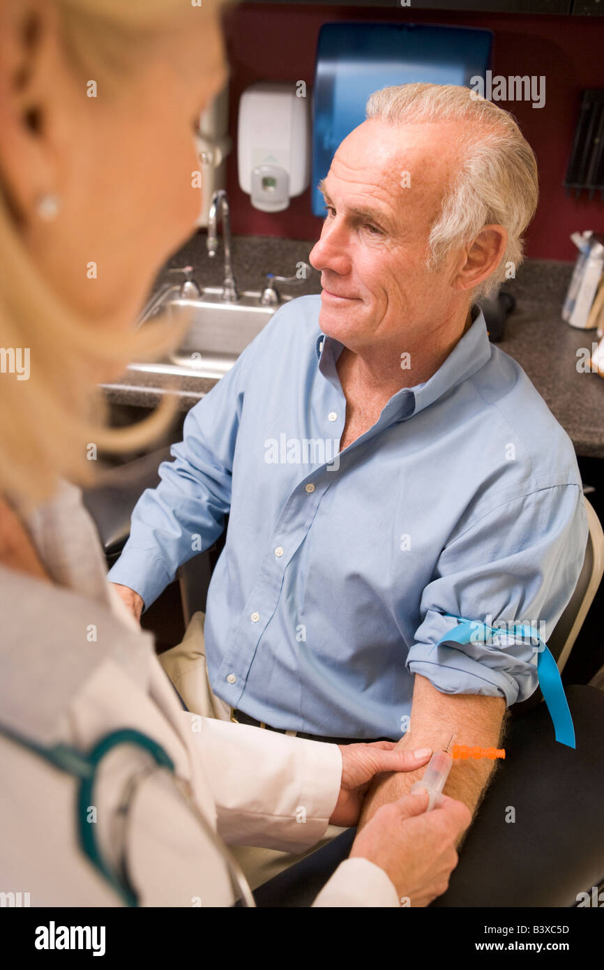 Middle Aged Man Having Blood Test Done Stock Photo - Alamy