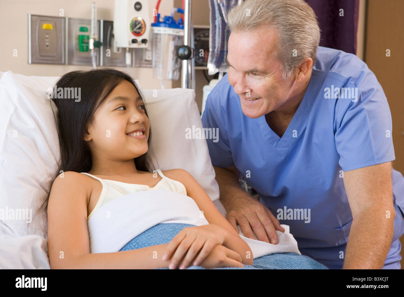 Doctor Checking Up On Patient Stock Photo - Alamy