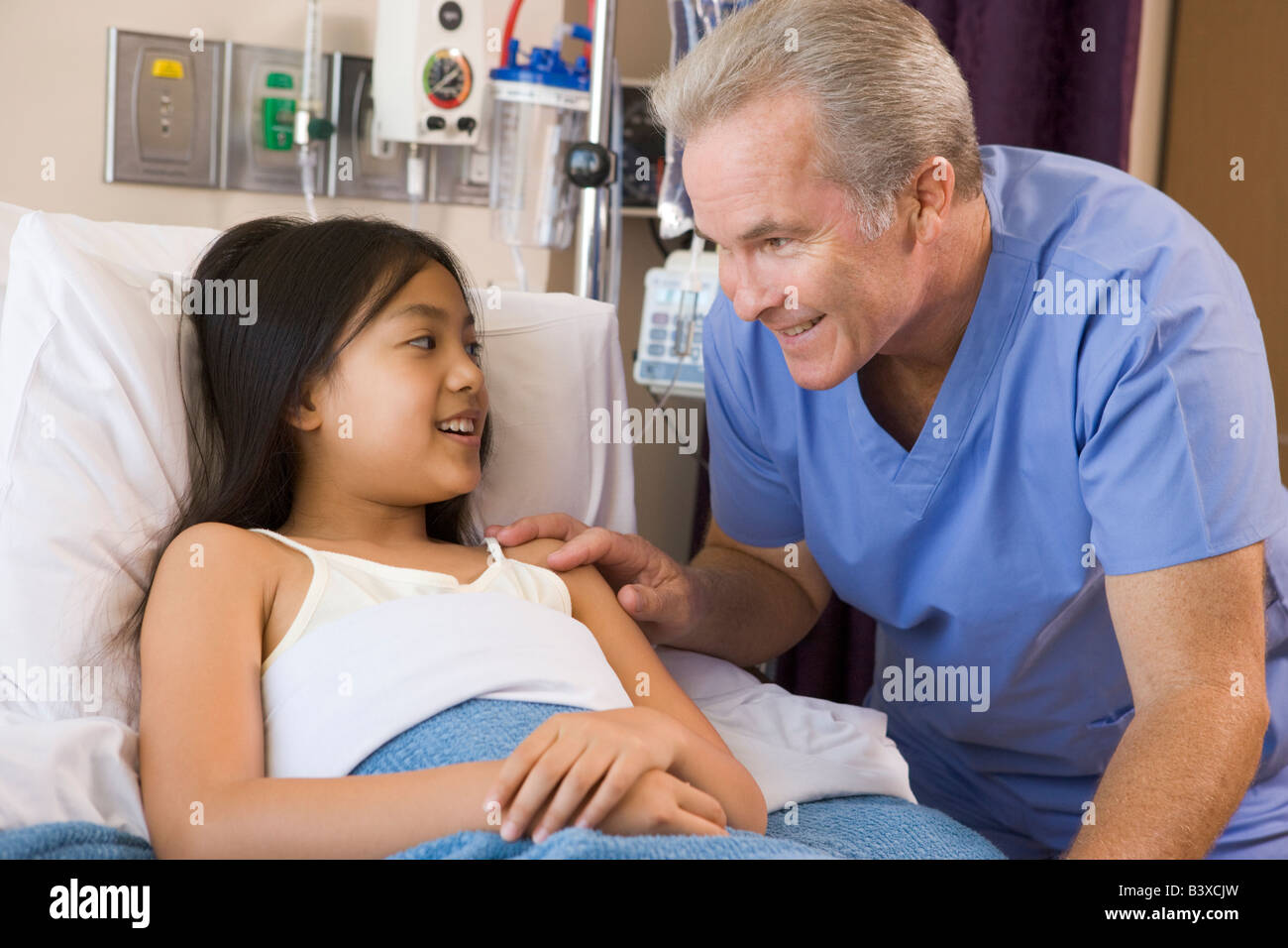 Doctor Checking Up On Patient Stock Photo - Alamy