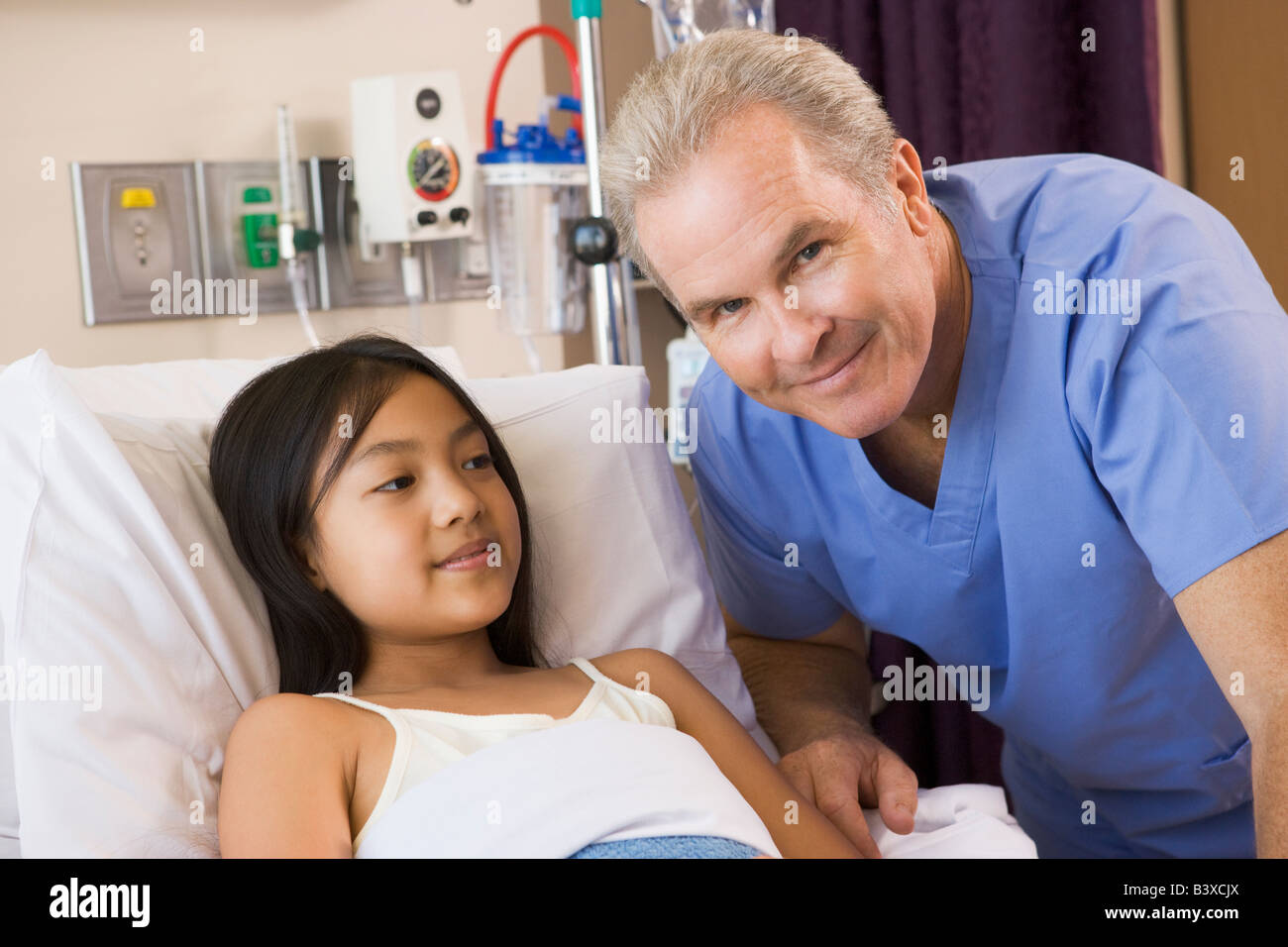 Doctor Checking Up On His Patient Stock Photo - Alamy