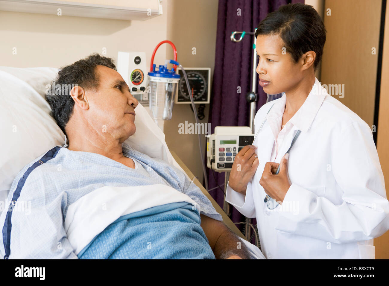 Doctor And Patient Talking To Each Other Stock Photo - Alamy