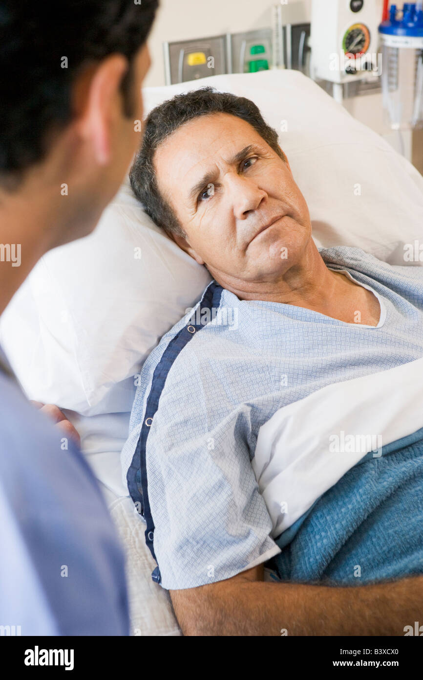 Patient Looking At Doctor Stock Photo - Alamy