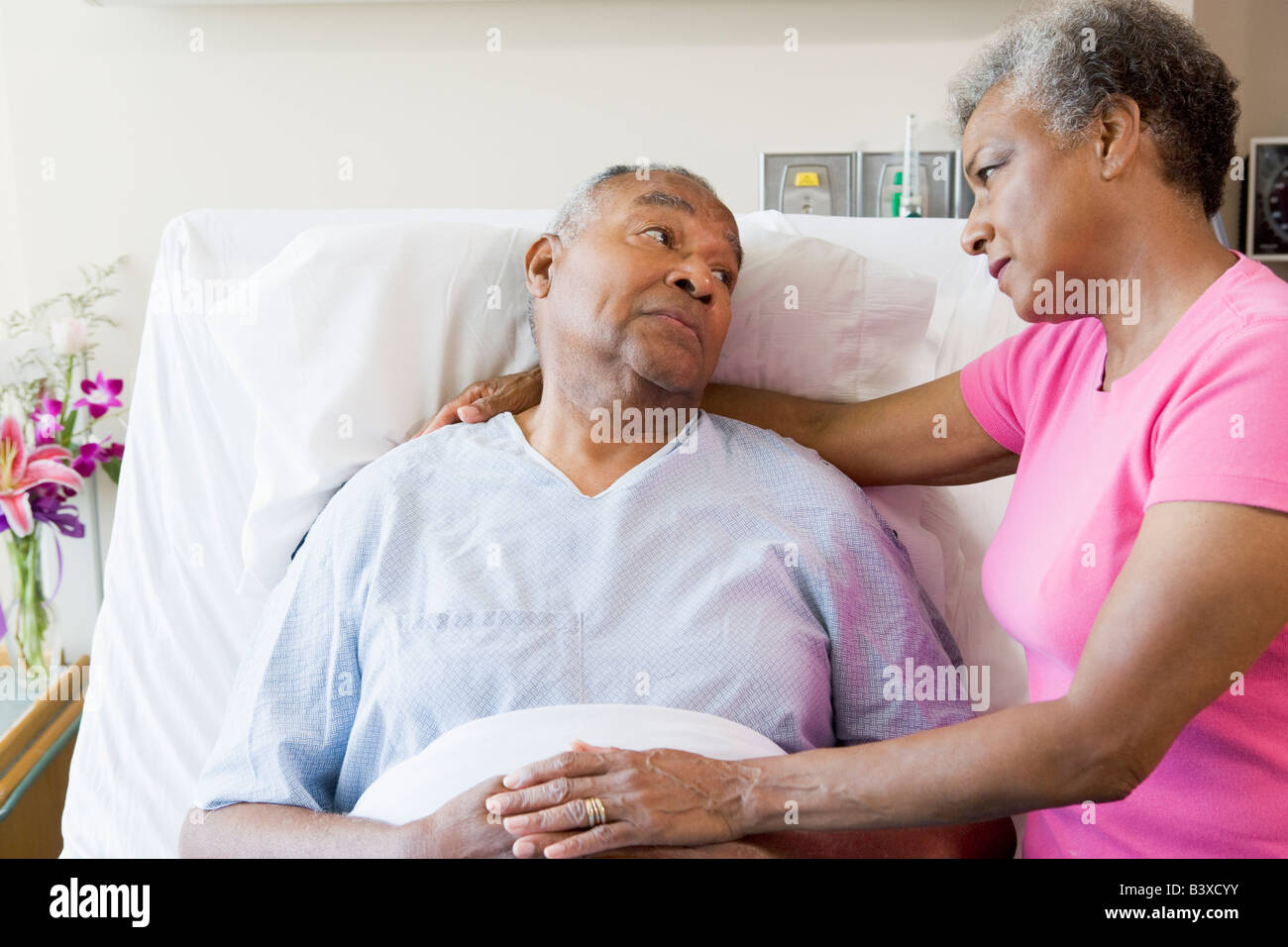 Man hospital bed wife visitor hi-res stock photography and images - Alamy