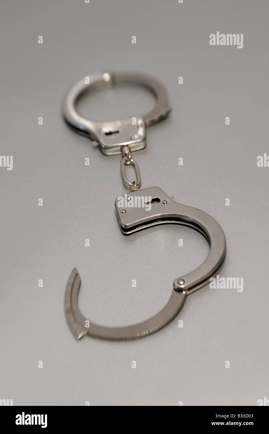 To handcuff hi-res stock photography and images - Alamy