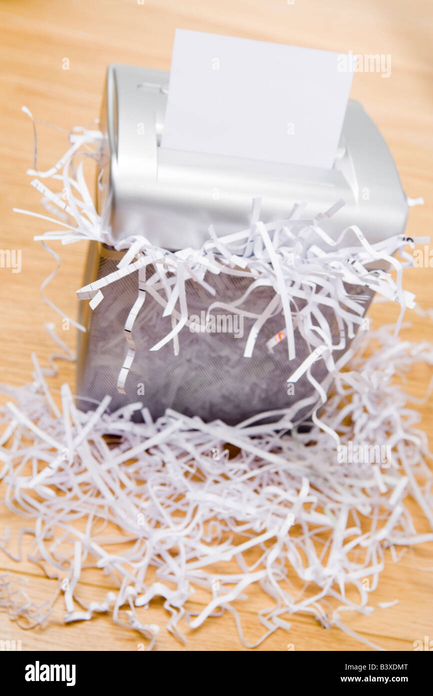 An Overflowing Paper Shredder Stock Photo - Alamy