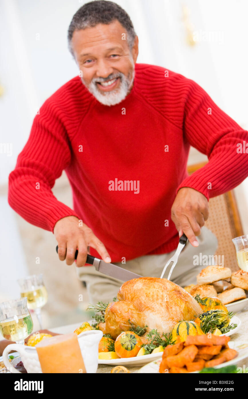 Man Carving Roast Chicken Stock Photo - Alamy