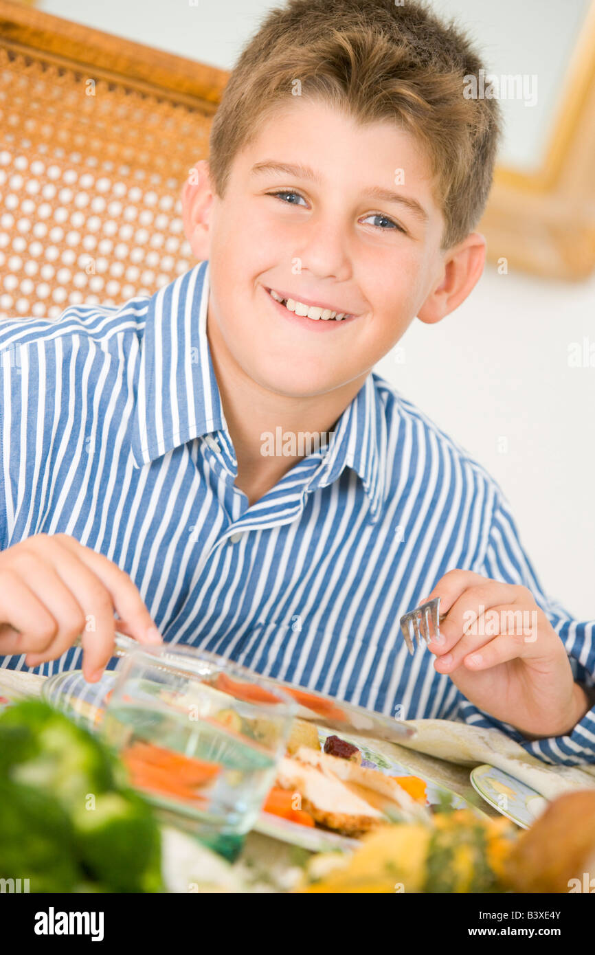 Boy At Christmas Dinner Stock Photo - Alamy