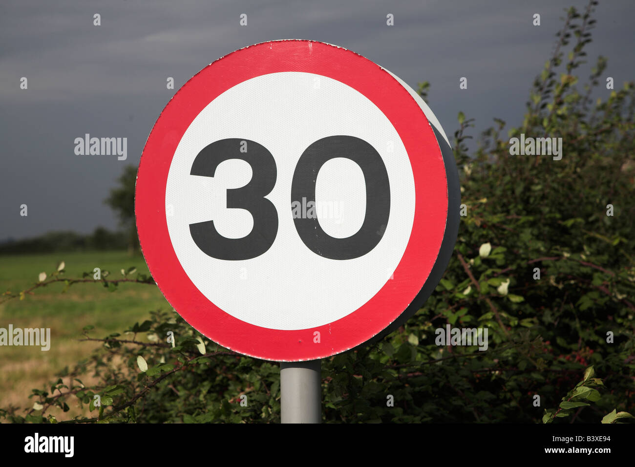 Thirty mile and hour circular road sign Stock Photo - Alamy