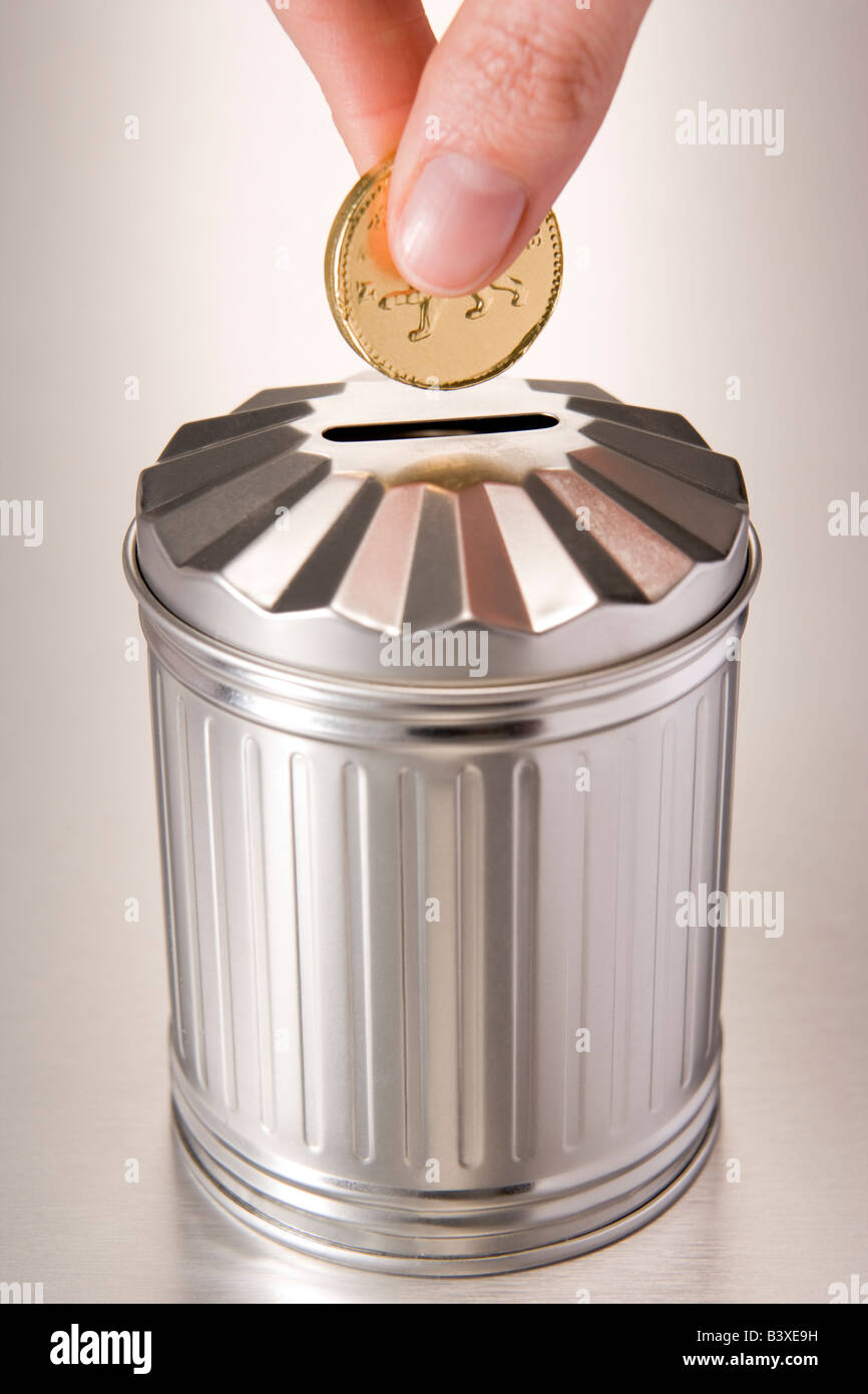Throwing money down the drain hi-res stock photography and images - Alamy