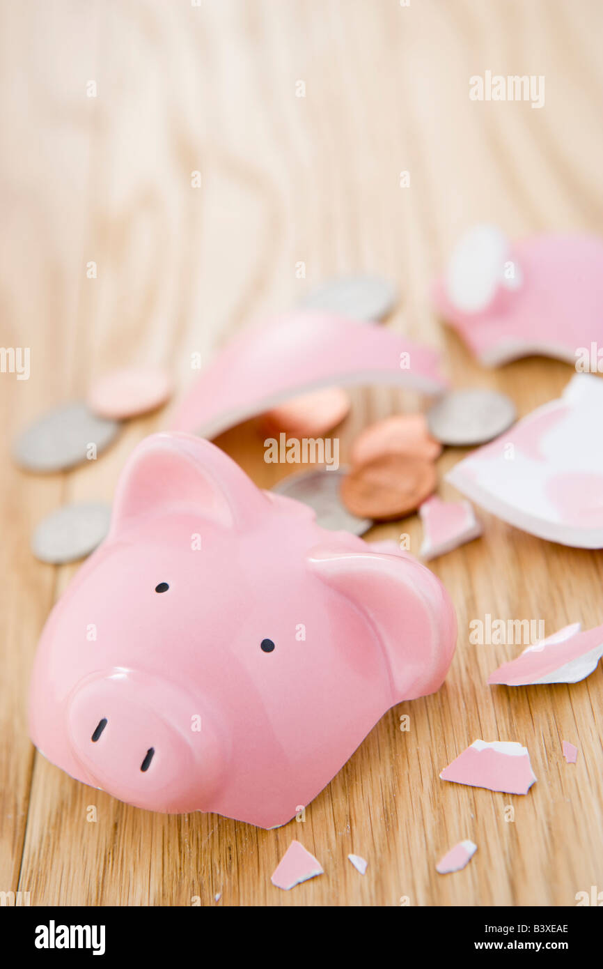 Smashed Piggy Bank Stock Photo - Alamy