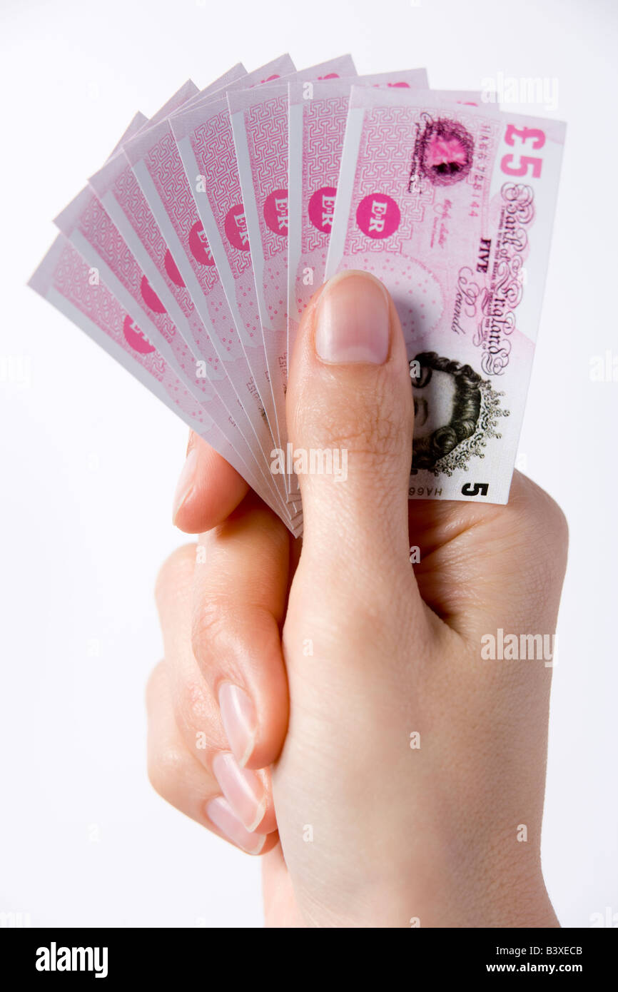 Fistful Of Money Stock Photo - Alamy