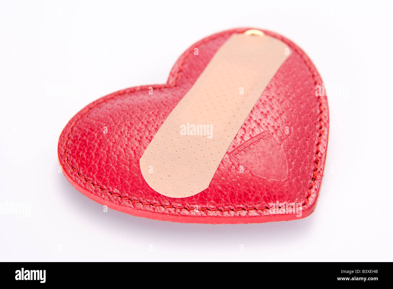 Band Aid Covering Heart Stock Photo - Alamy