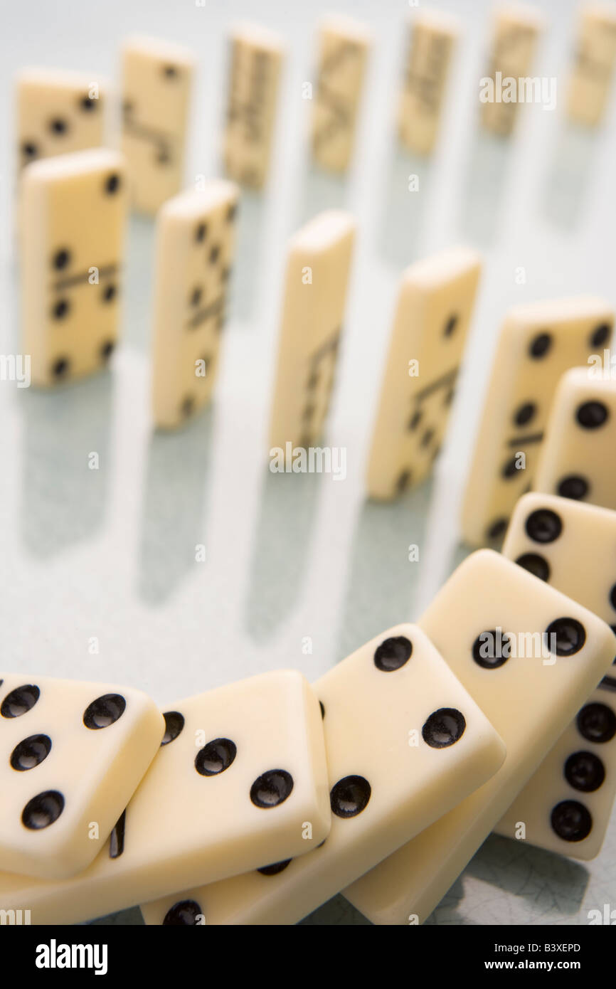 Arrangement Of Domino Pieces Collapsing Stock Photo - Alamy