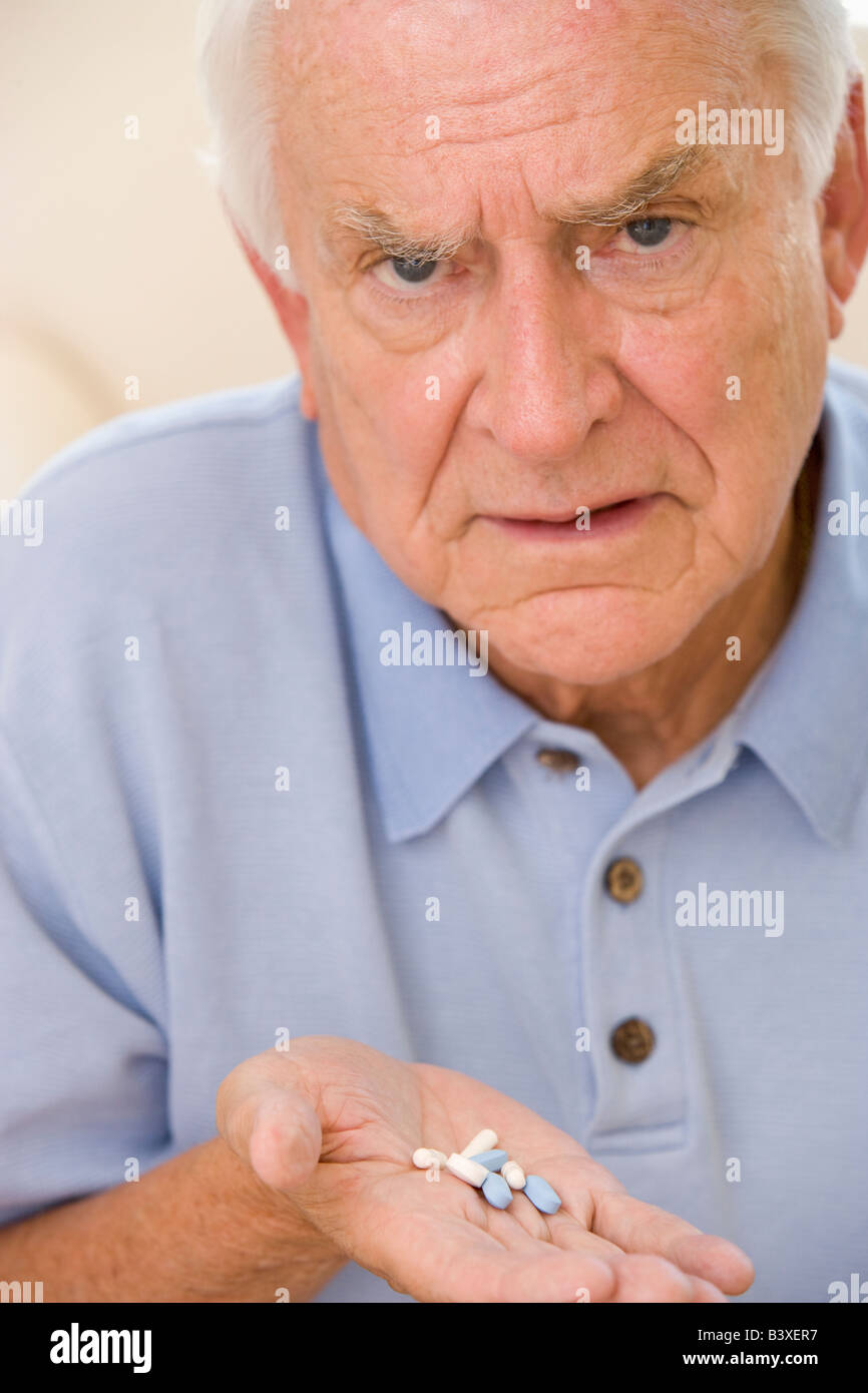 Senior Man Holding Prescription Drugs Stock Photo - Alamy