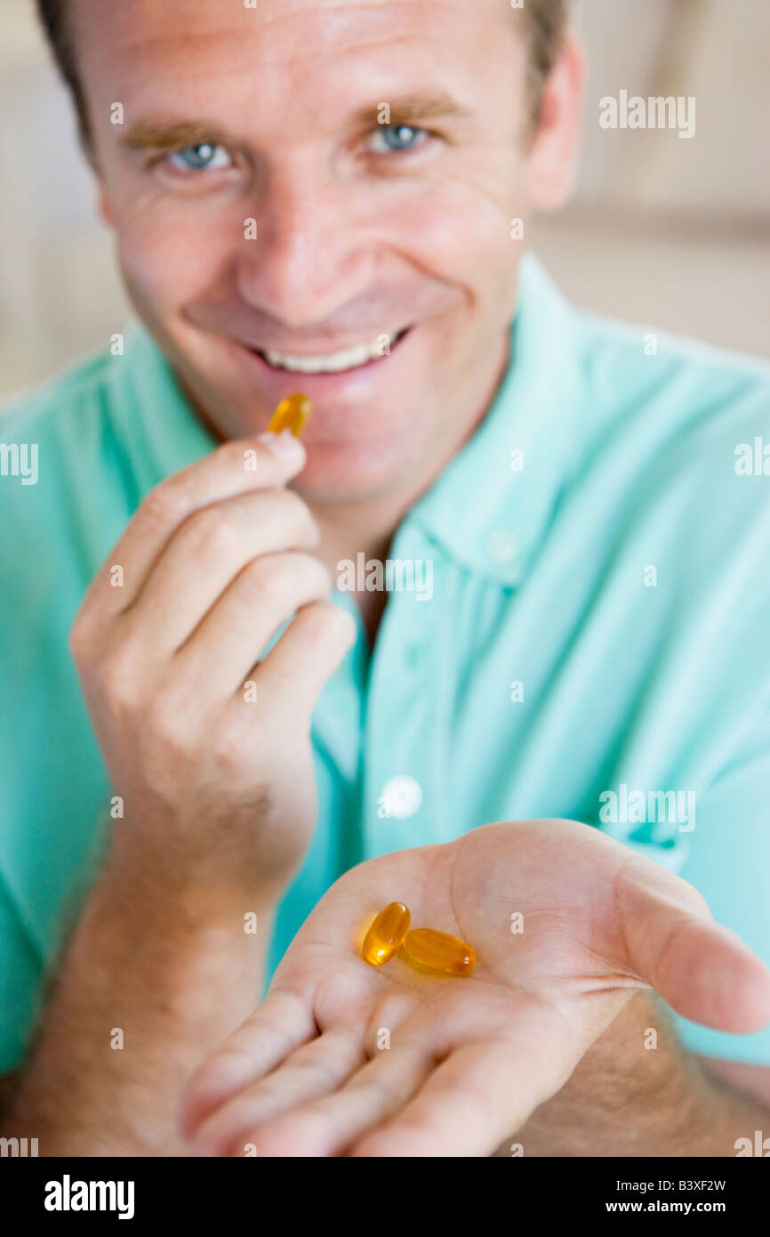 Man Taking Pills Stock Photo - Alamy