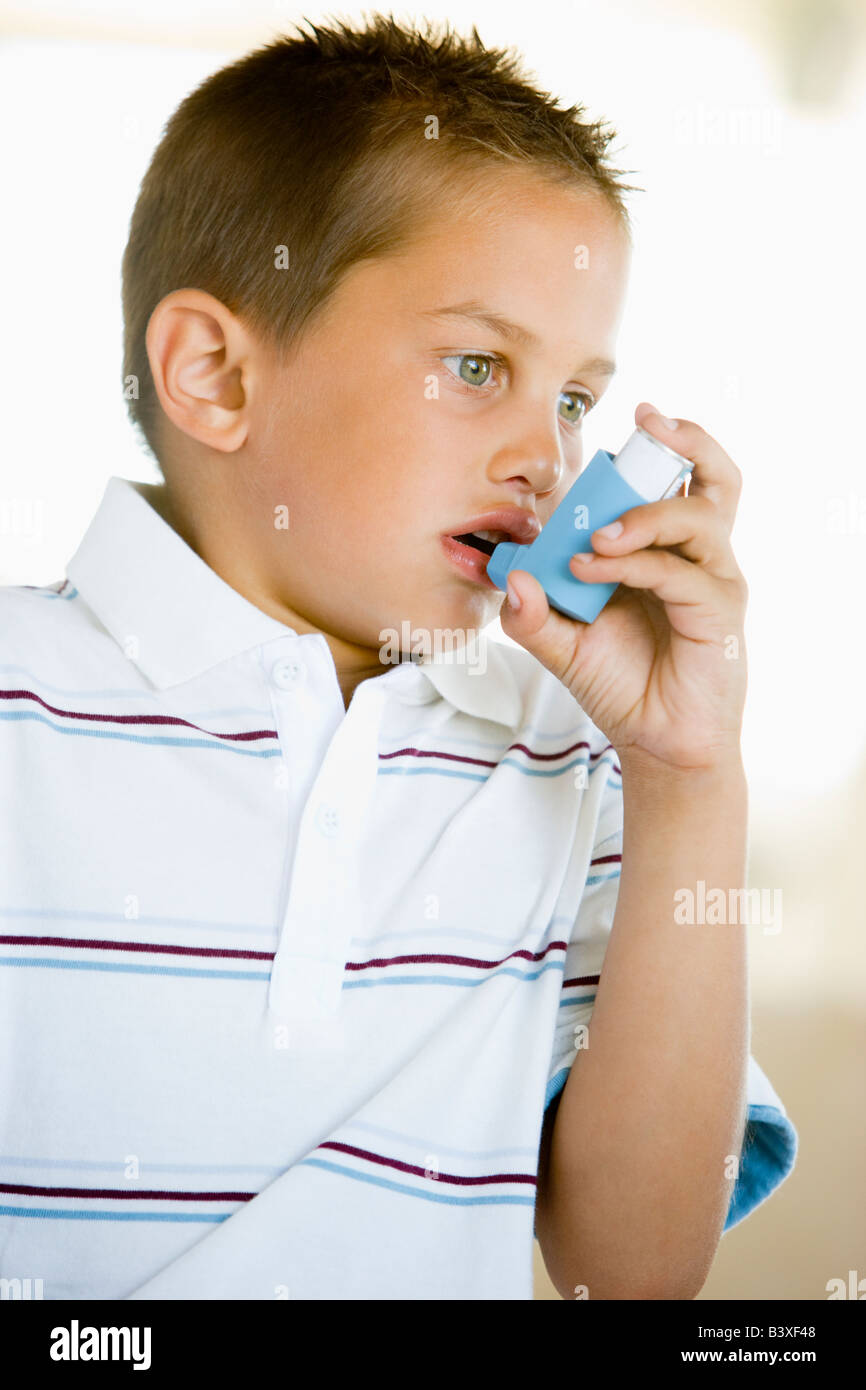 Boy Using An Inhaler Stock Photo - Alamy