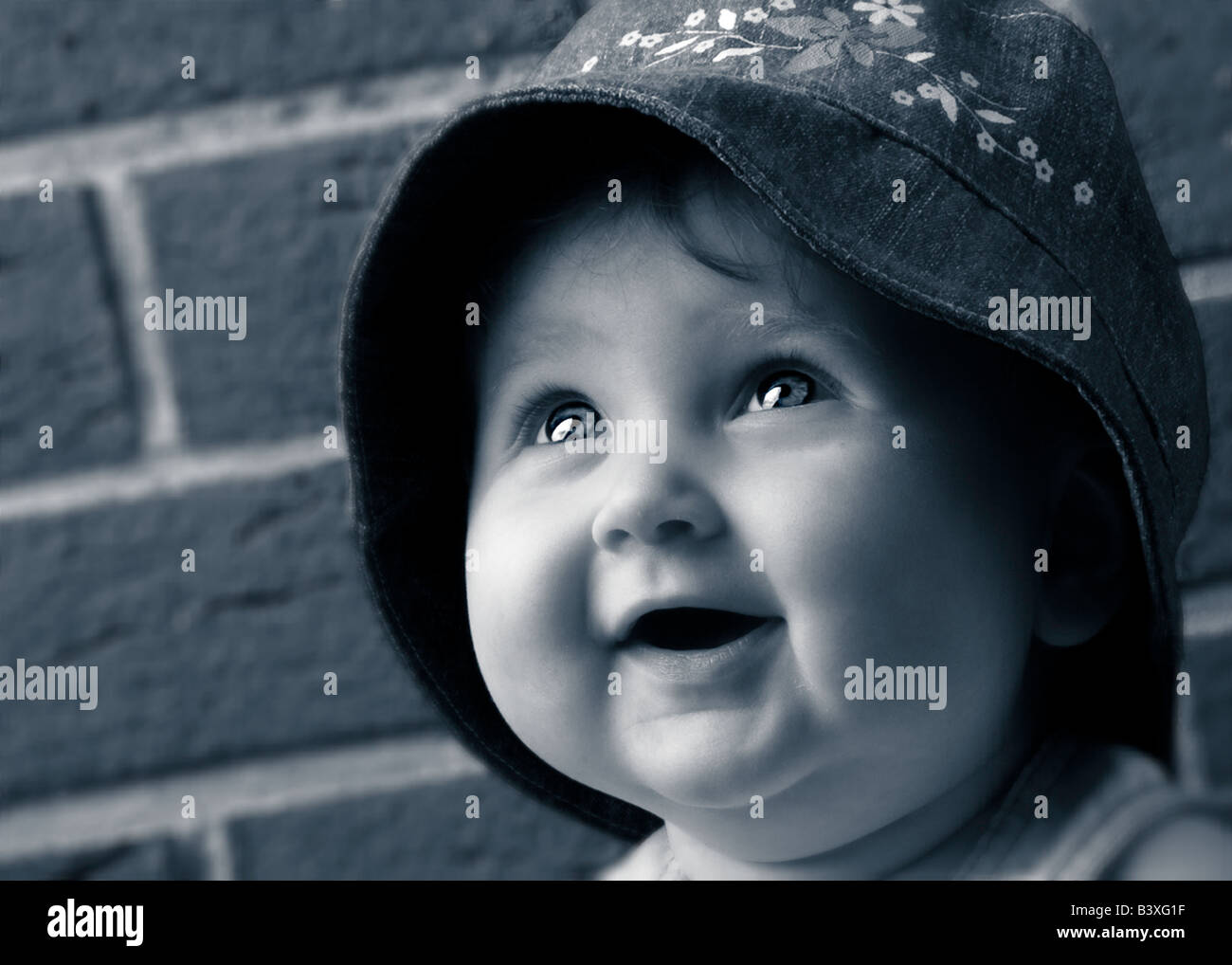 Happy baby in sunhat Stock Photo - Alamy