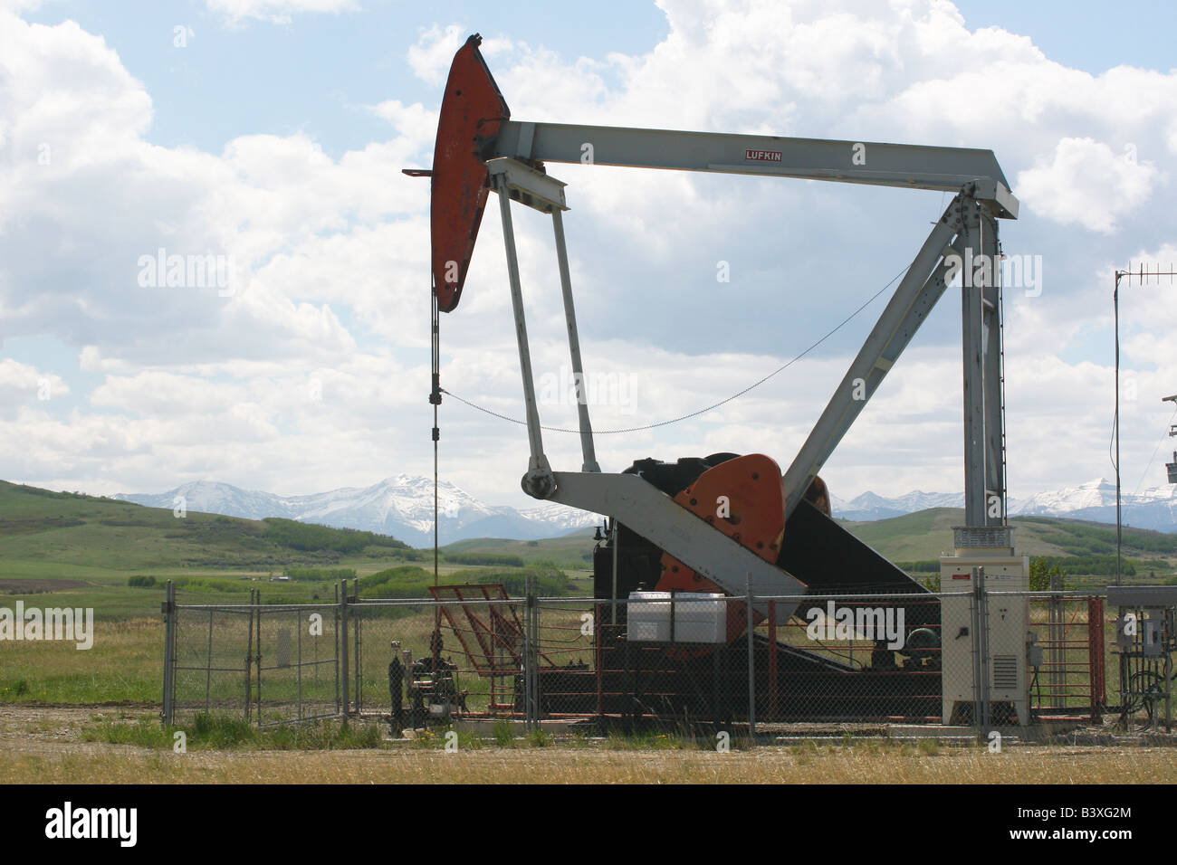 Horizontal Pumping crude in the foothills of the Canadian Rockies Stock ...