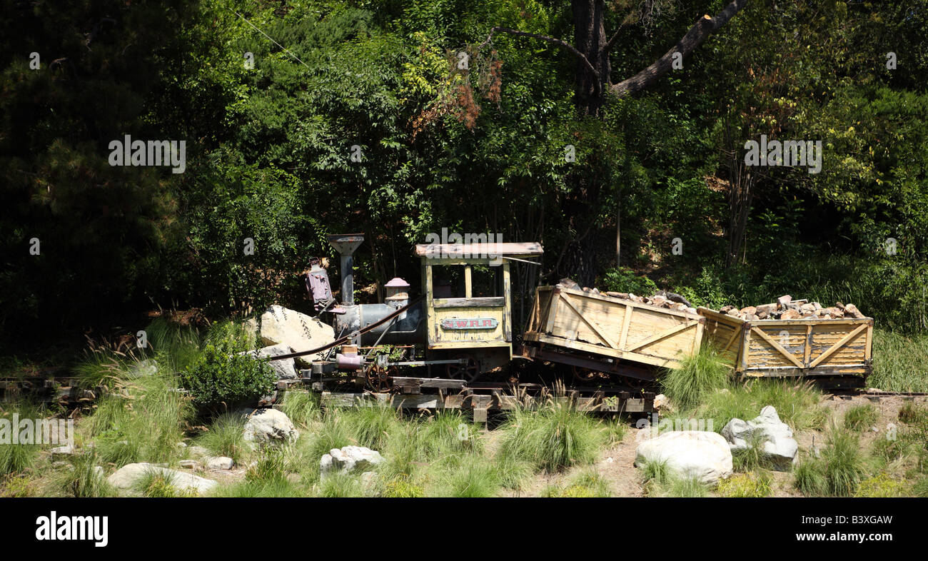 Decrepit narrow guage steam engine, used here for amusement as part of ...