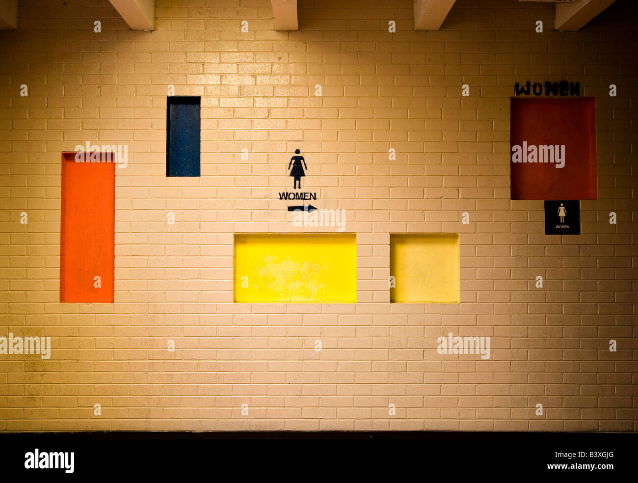 Women's restroom directional sign at a roadside rest stop Stock Photo ...