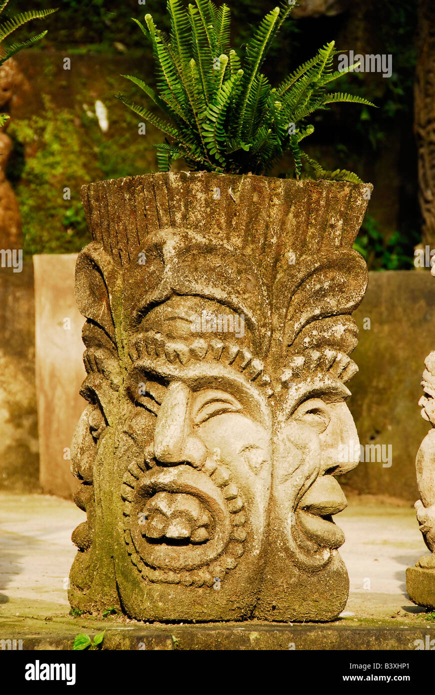 strange face looking Statues outside temple in Ubud , Bali , indonesia ...