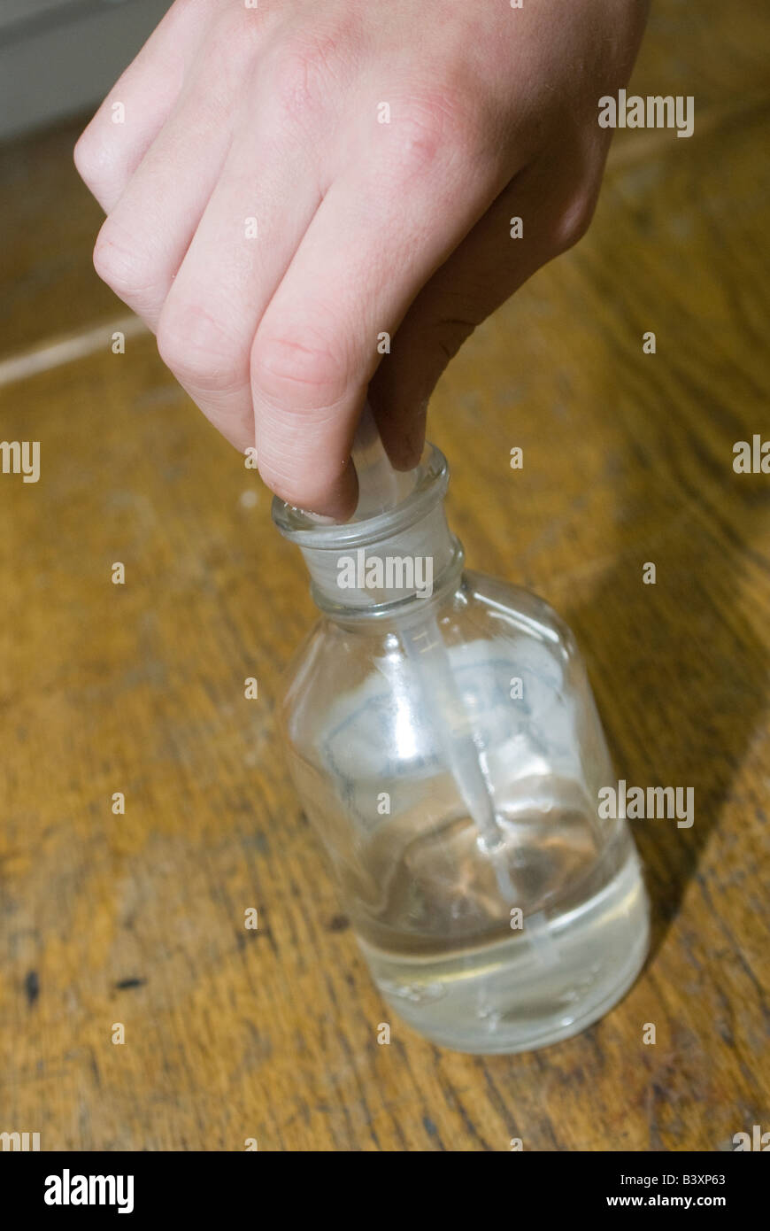 experiment taking place in a school classroom during a science lesson ...