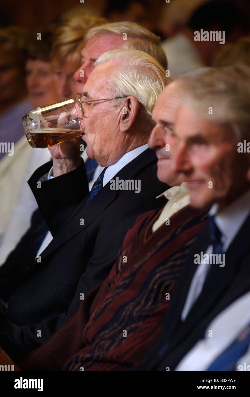 MEMBERS OF THE FRONCYSYLLTE MALE VOICE CHOIR LISTENS LISTENING TO THEIR ...