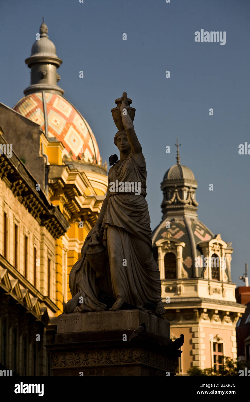 Statue in front of historic houses Stock Photo - Alamy