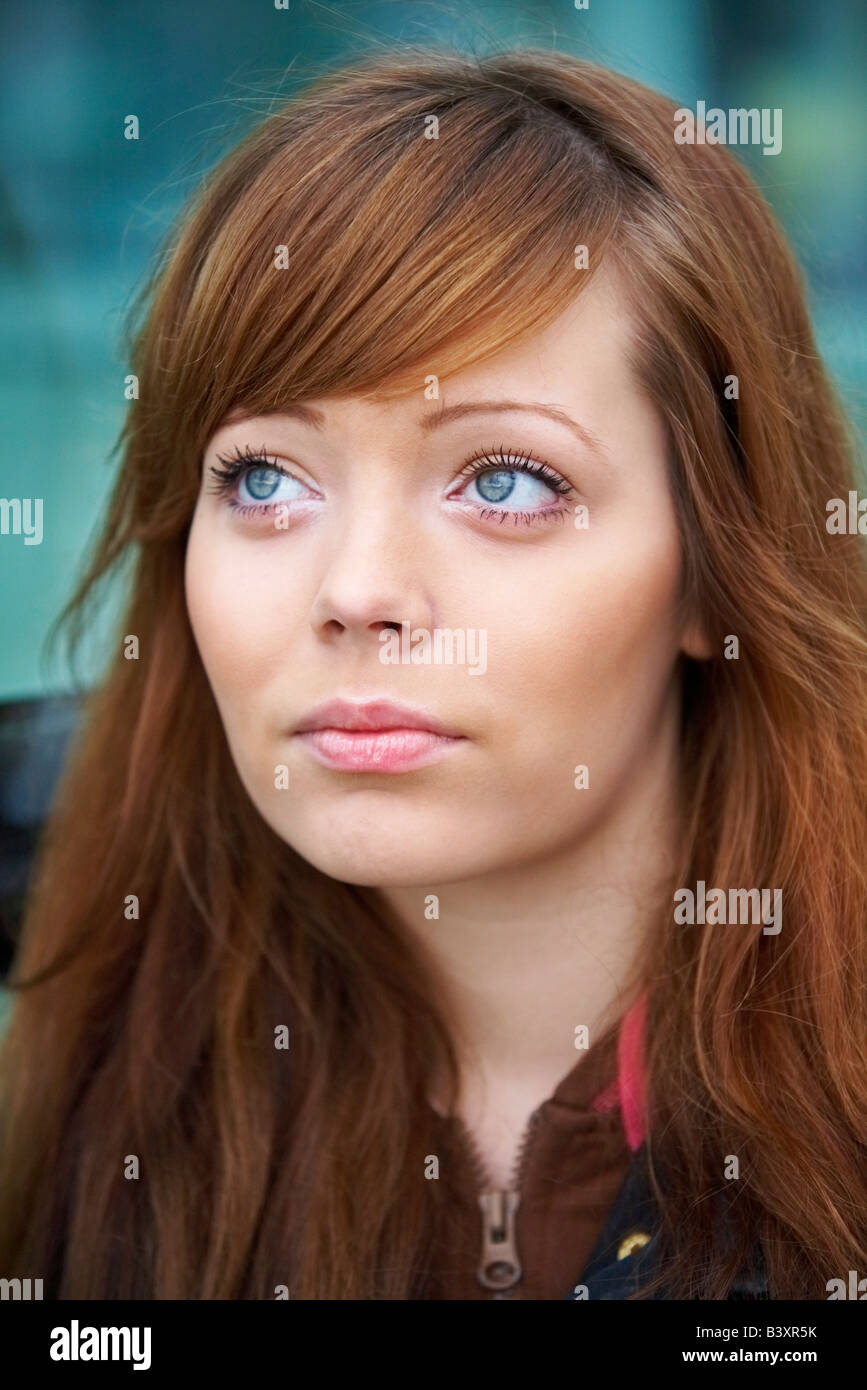 Portrait of teenage girl contemplating in outdoor location Stock Photo ...